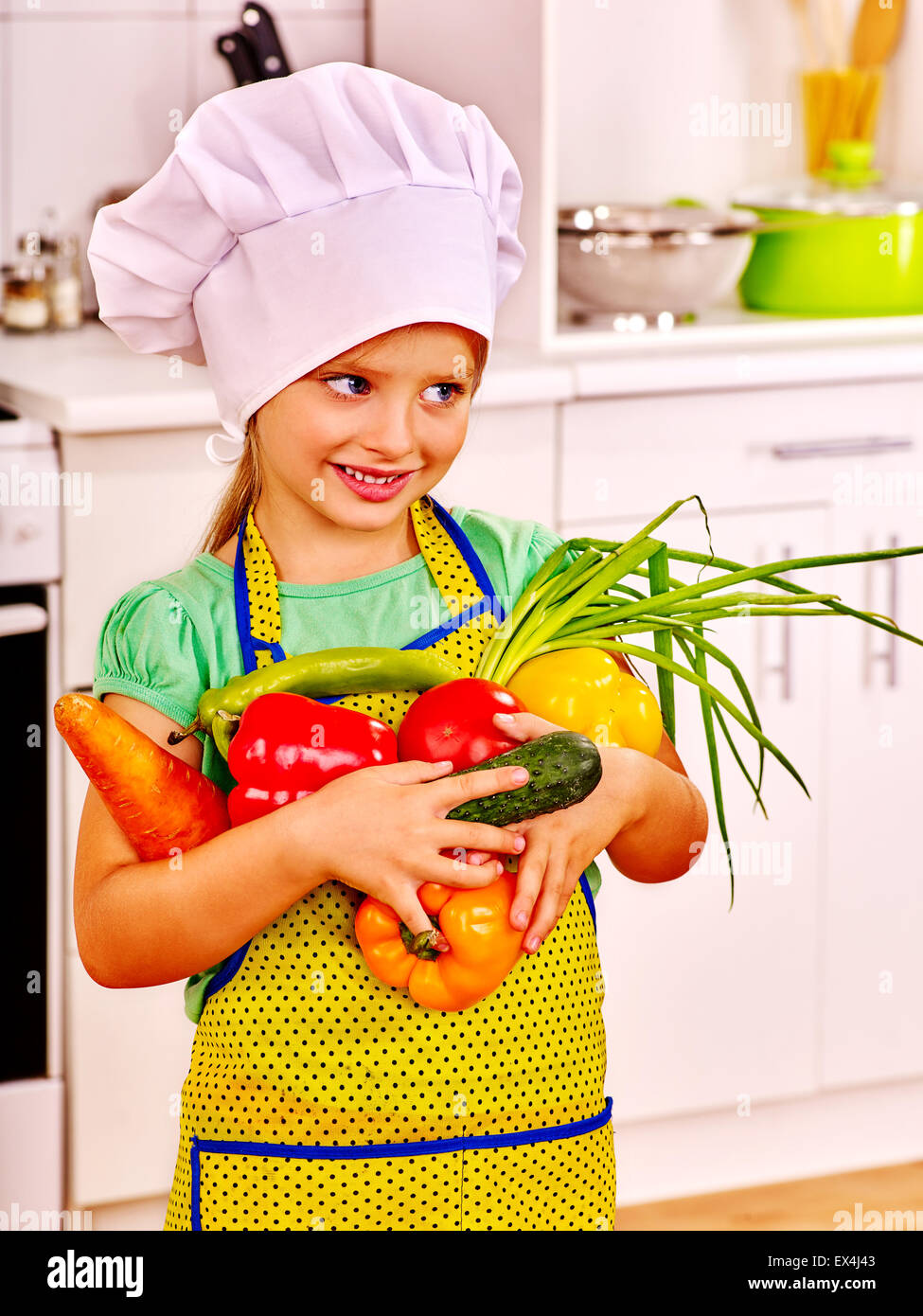 Child cooking at kitchen Stock Photo - Alamy