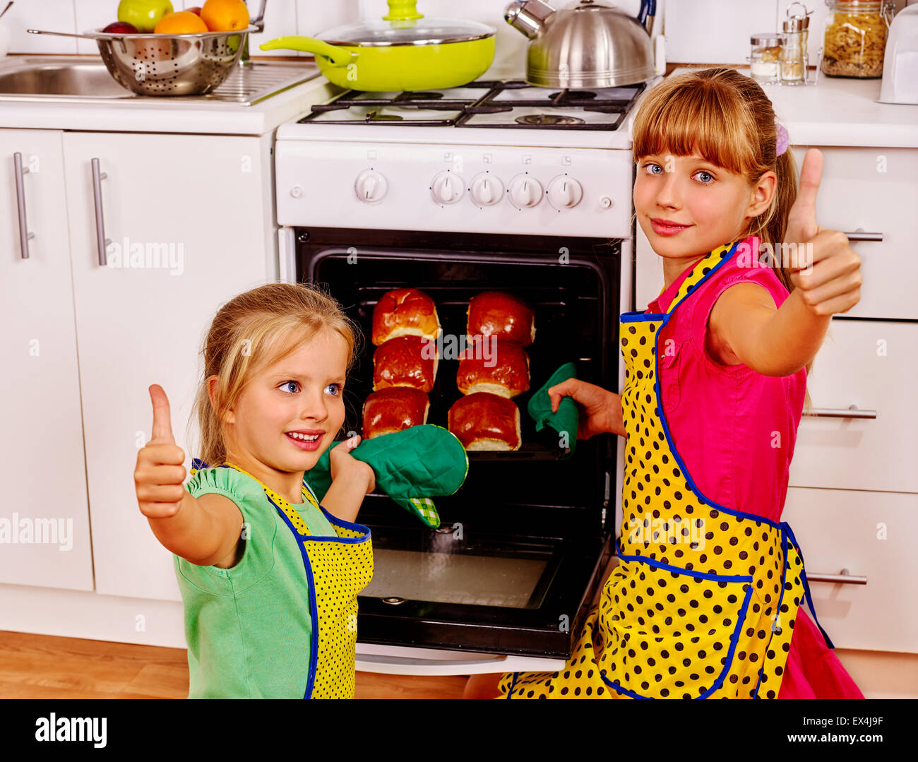 Children bake chocolate buns Stock Photo - Alamy