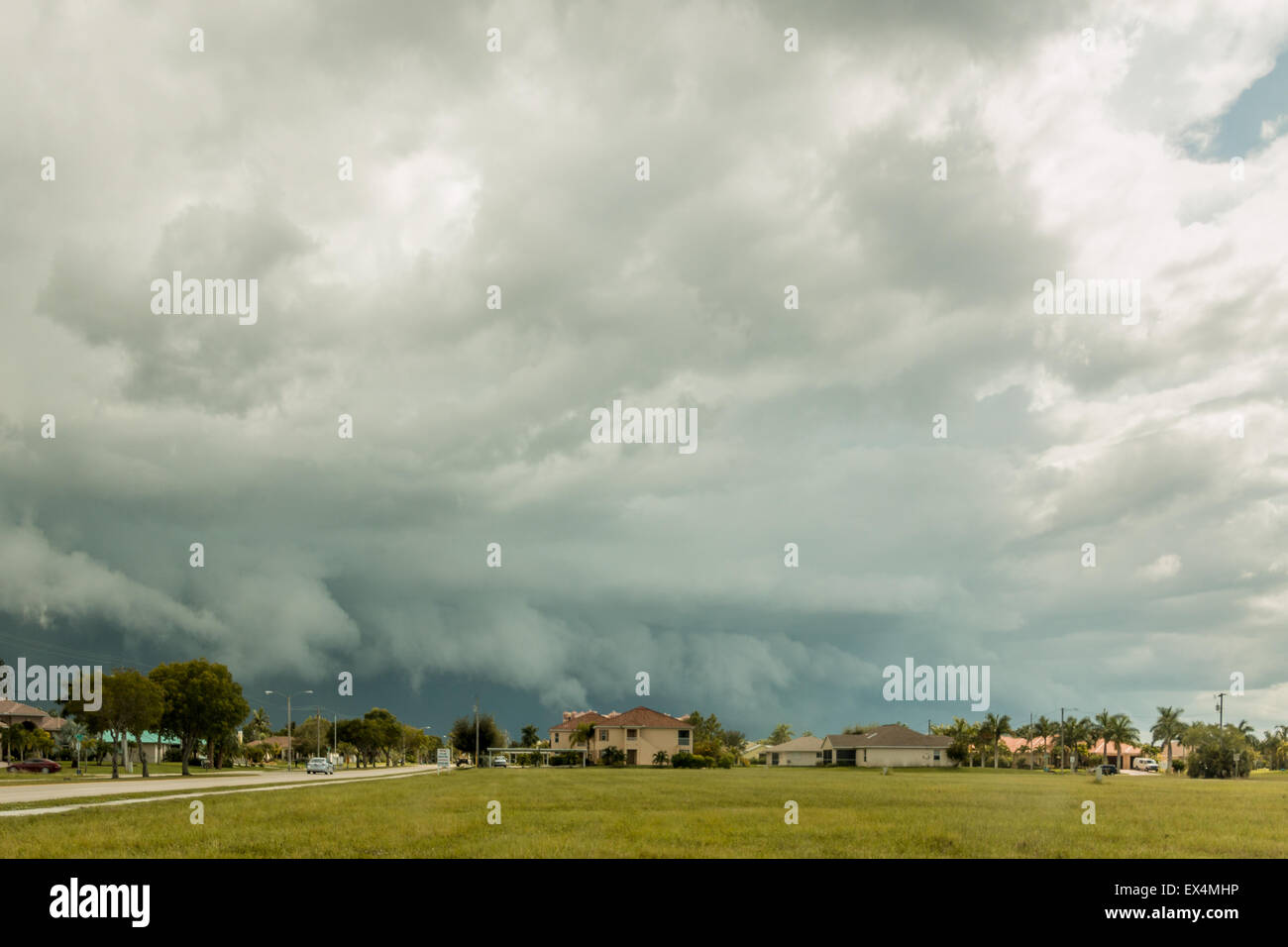Dark stormy clouds carrying heavy rainfall on a typical summer day in ...