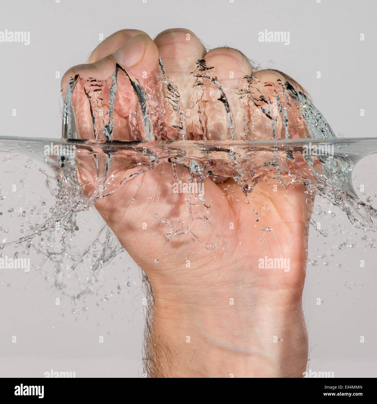 Fist punching water hi-res stock photography and images - Alamy