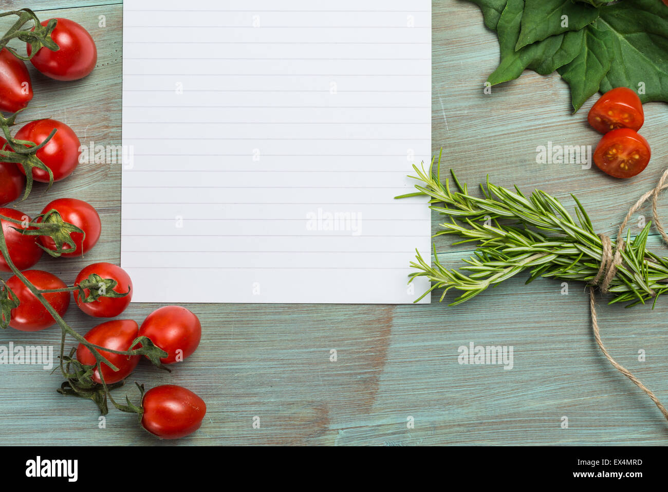 Blank white paper and fresh colorful vegetables on kitchen table Stock ...