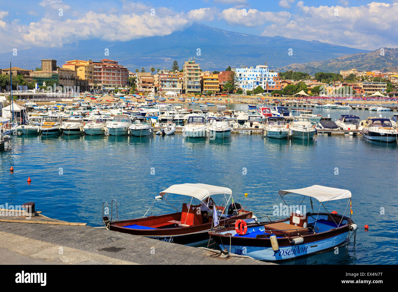 Harbour at Giardini Naxos, Sicily, with a view to Mount Etna Stock ...