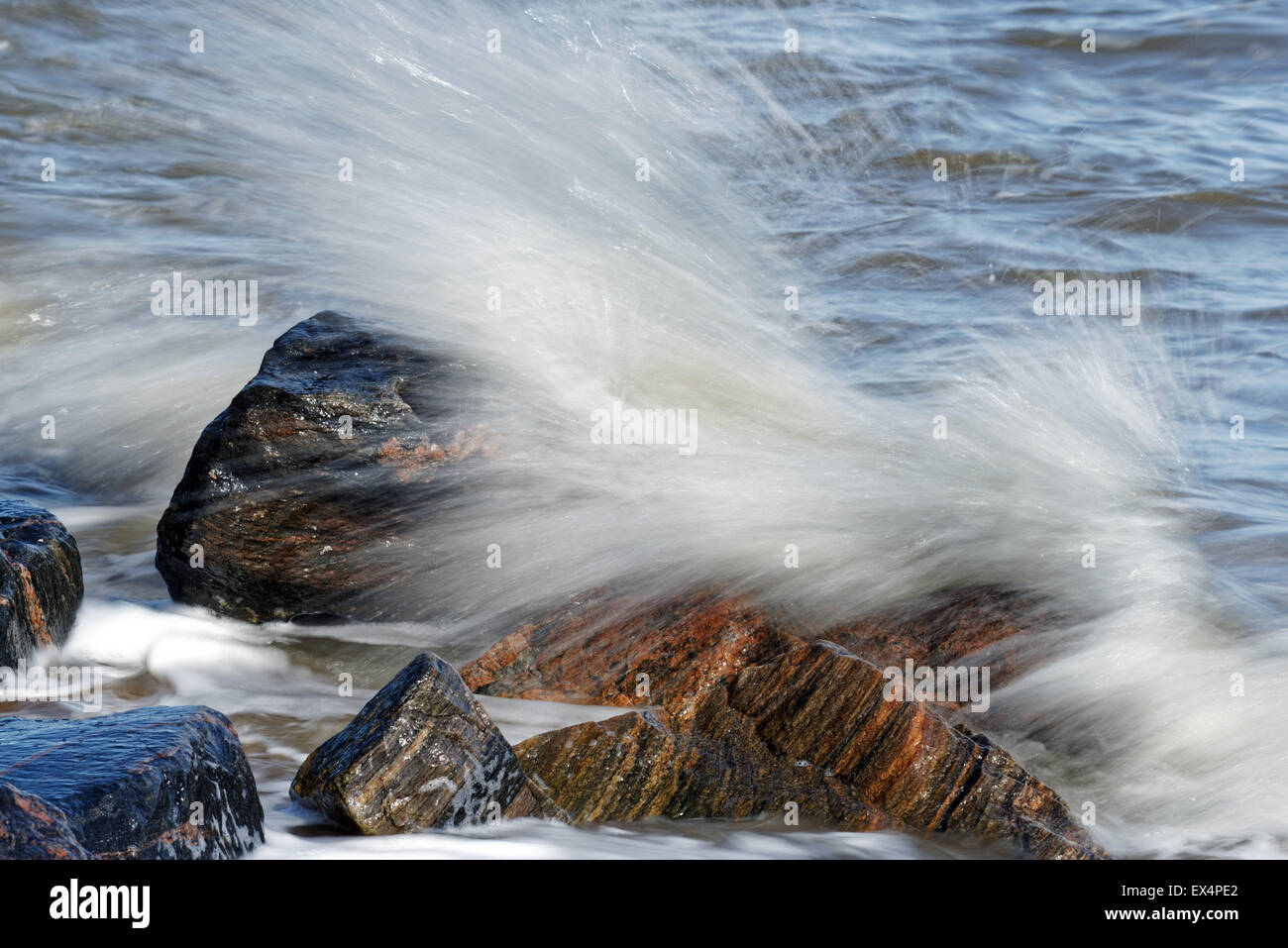 Small waves on sea rocks hi-res stock photography and images - Alamy