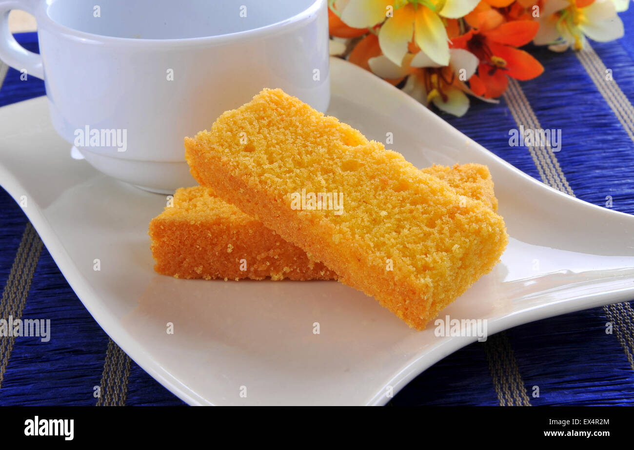 Cake Rusk and Tea Cup Stock Photo - Alamy