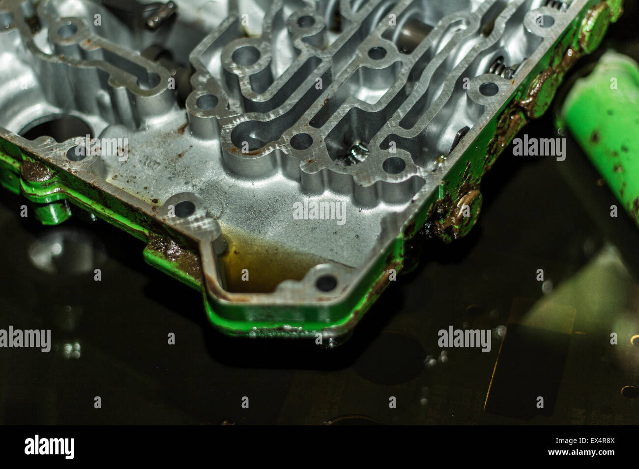 Engine head in a workshop Stock Photo - Alamy