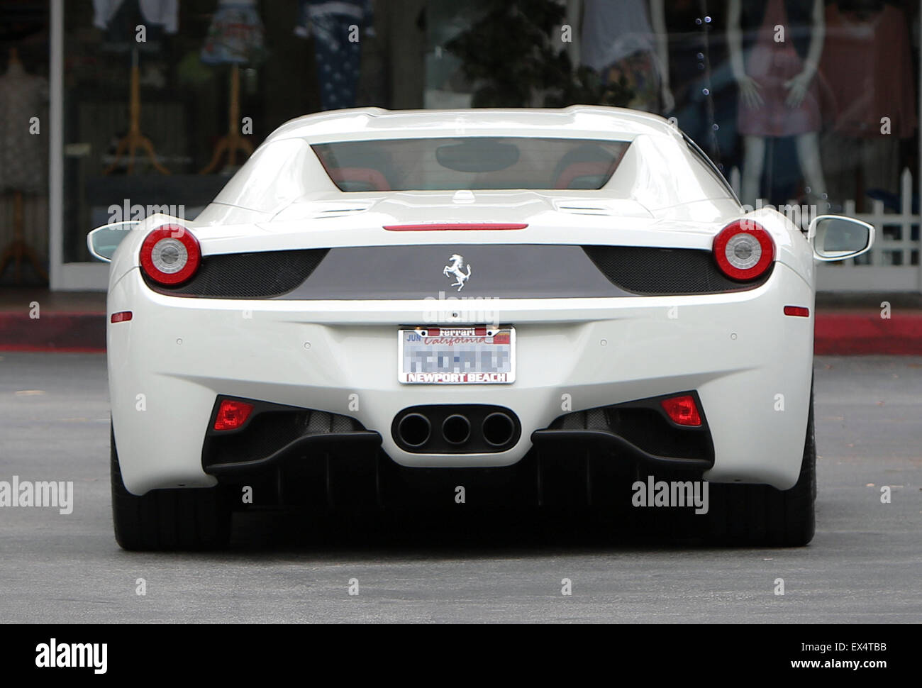Rod Stewart out with his wife driving his white Ferrari 458 Spider in ...