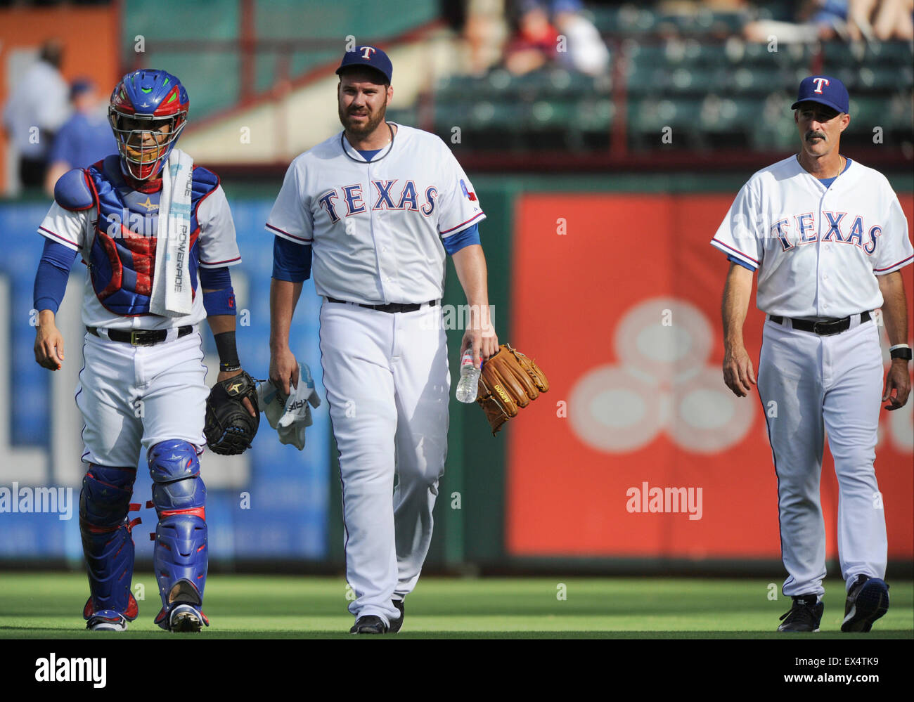 JUL 05, 2015: Texas Rangers catcher Robinson Chirinos #61 left, Texas ...