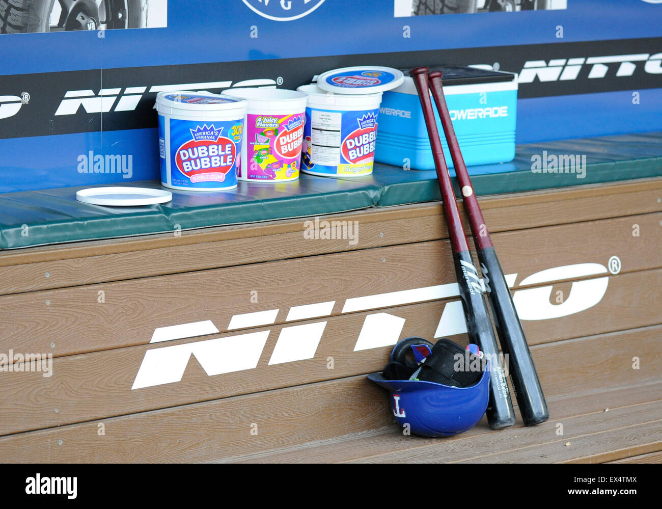 JUL 05, 2015: Bubble gum, bats and a helmet sit in the Texas Rangers ...