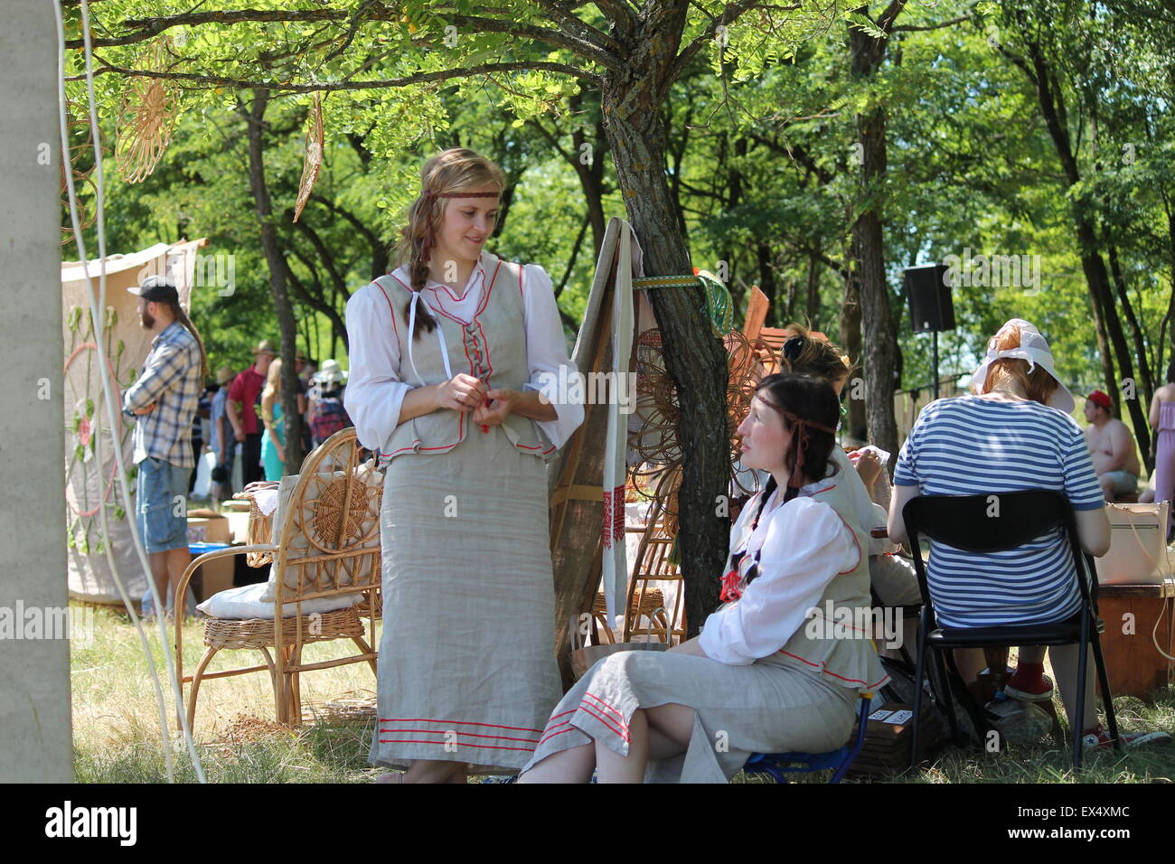two beautiful women in national dresses on fest of tradition and ...