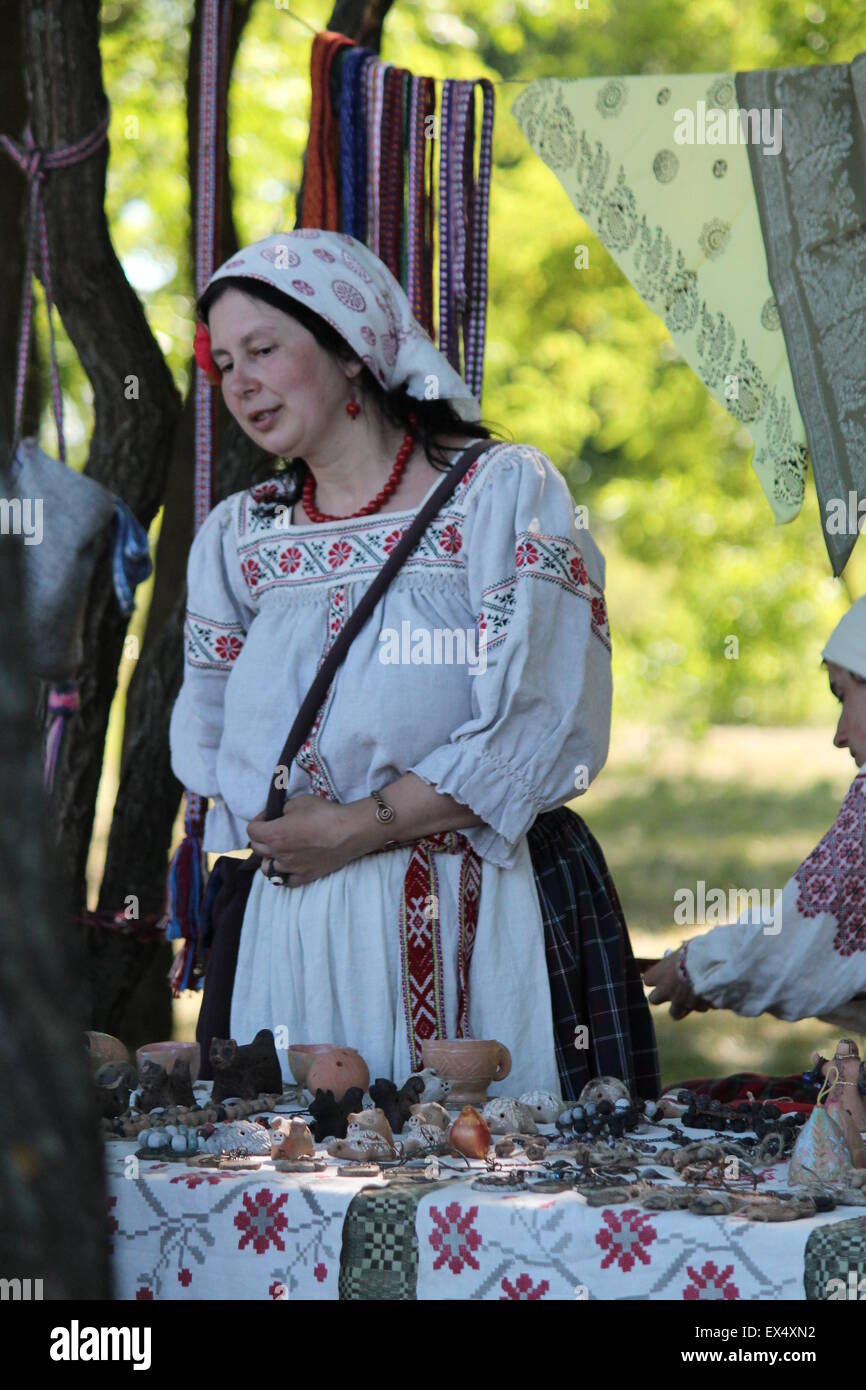 woman in national Belorussian dress on festival "Pride of Ancestor ...