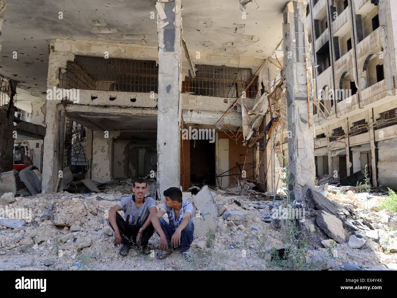 Rebuilding shattered homes hi-res stock photography and images - Alamy