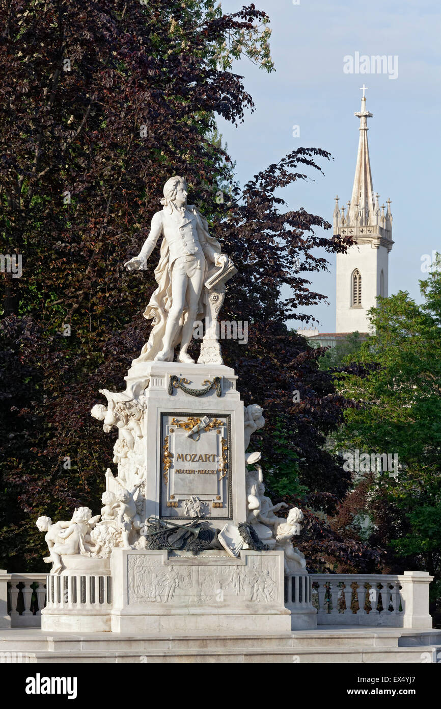 Mozart monument in Burggarten with Augustinian Church, Vienna, Austria ...