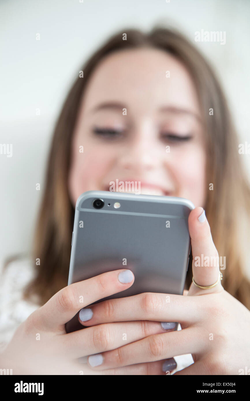 Teenage Girl Using Smartphone Stock Photo - Alamy