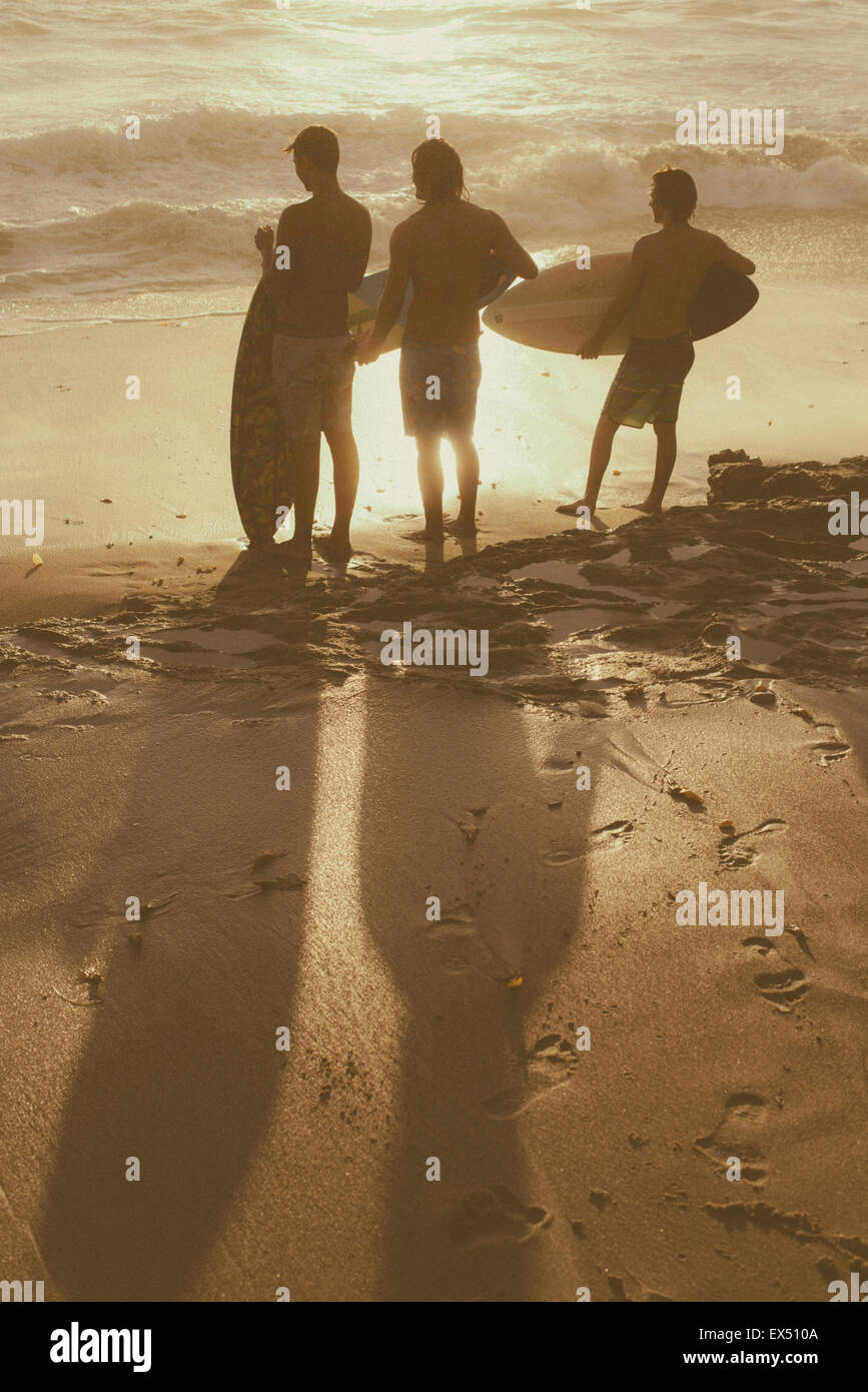 Three surfers above hi-res stock photography and images - Alamy