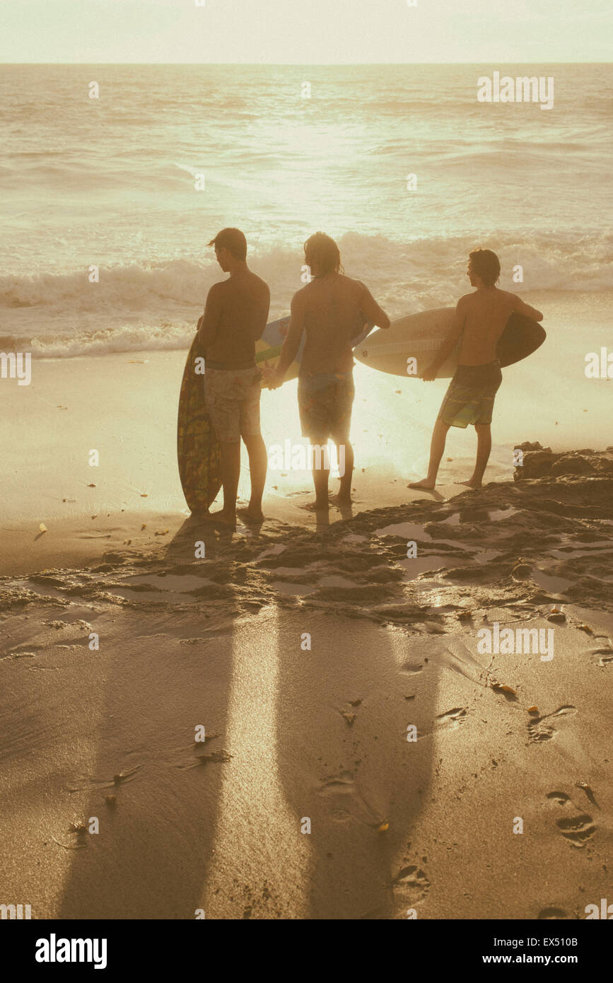 Three male surfers hi-res stock photography and images - Alamy