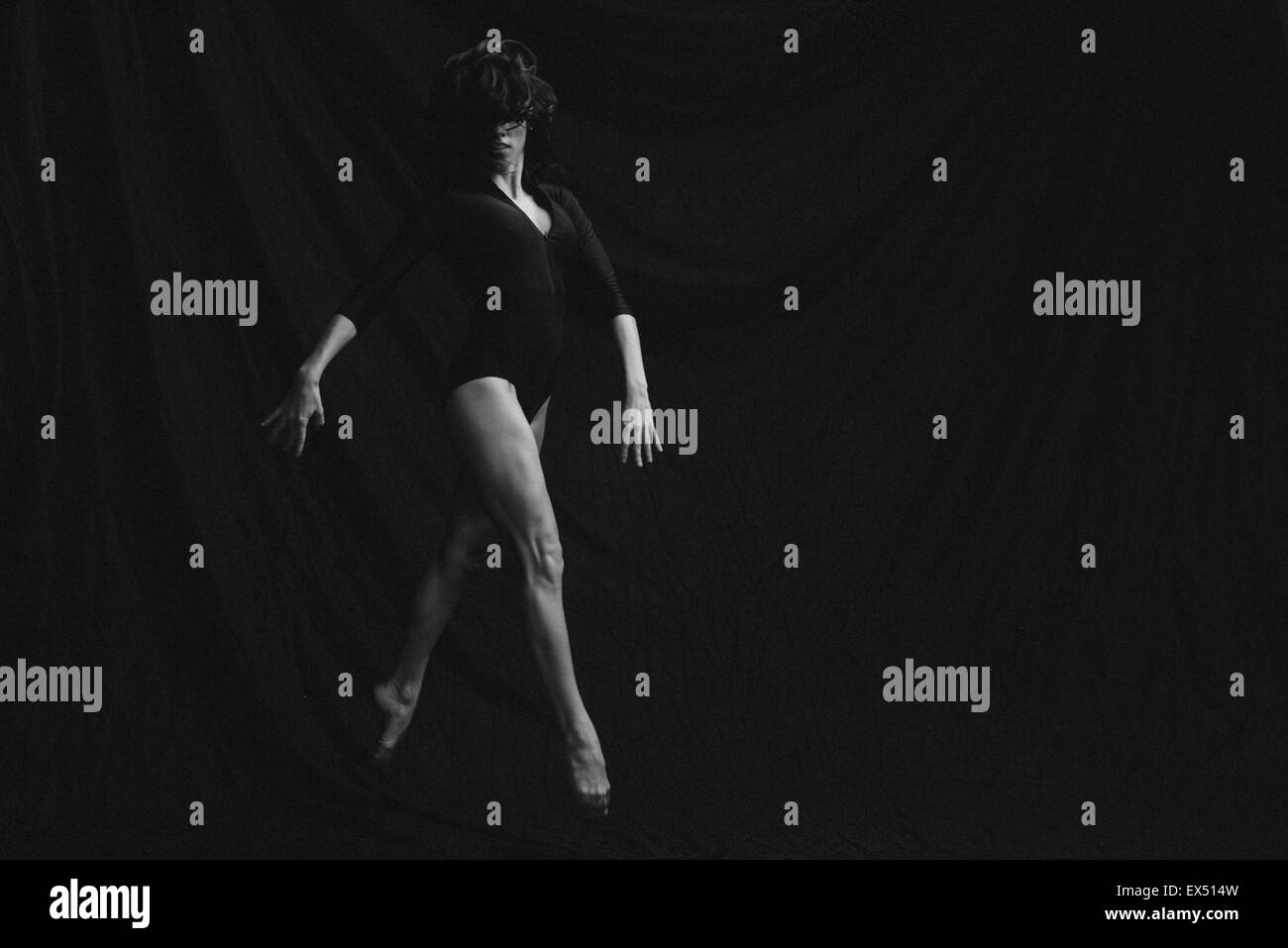 Female Ballet Dancer Leaping Mid Air High Resolution Stock Photography ...