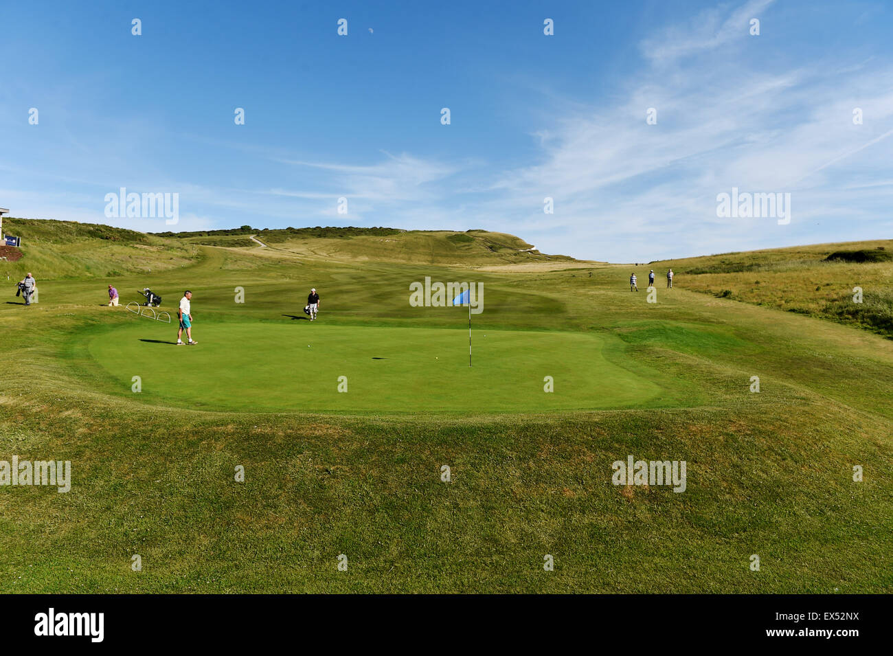 Golfers at the famous eighteenth hole of Seaford Head Golf Course and ...
