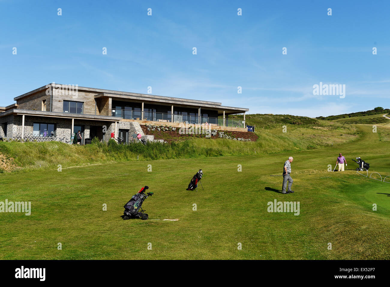 Golfers at the famous eighteenth hole of Seaford Head Golf Course and ...