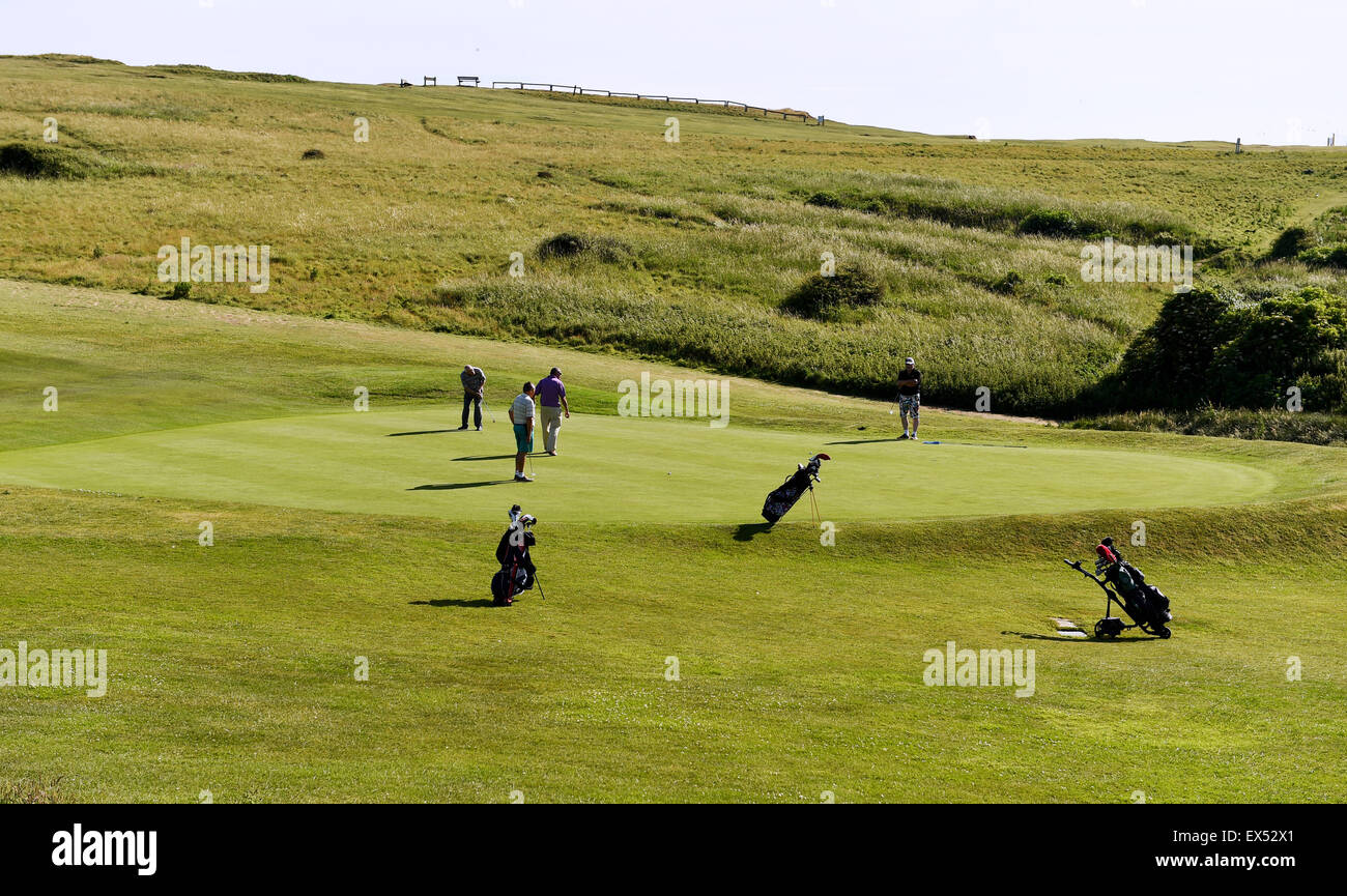 Golfers at the famous eighteenth hole of Seaford Head Golf Course and ...