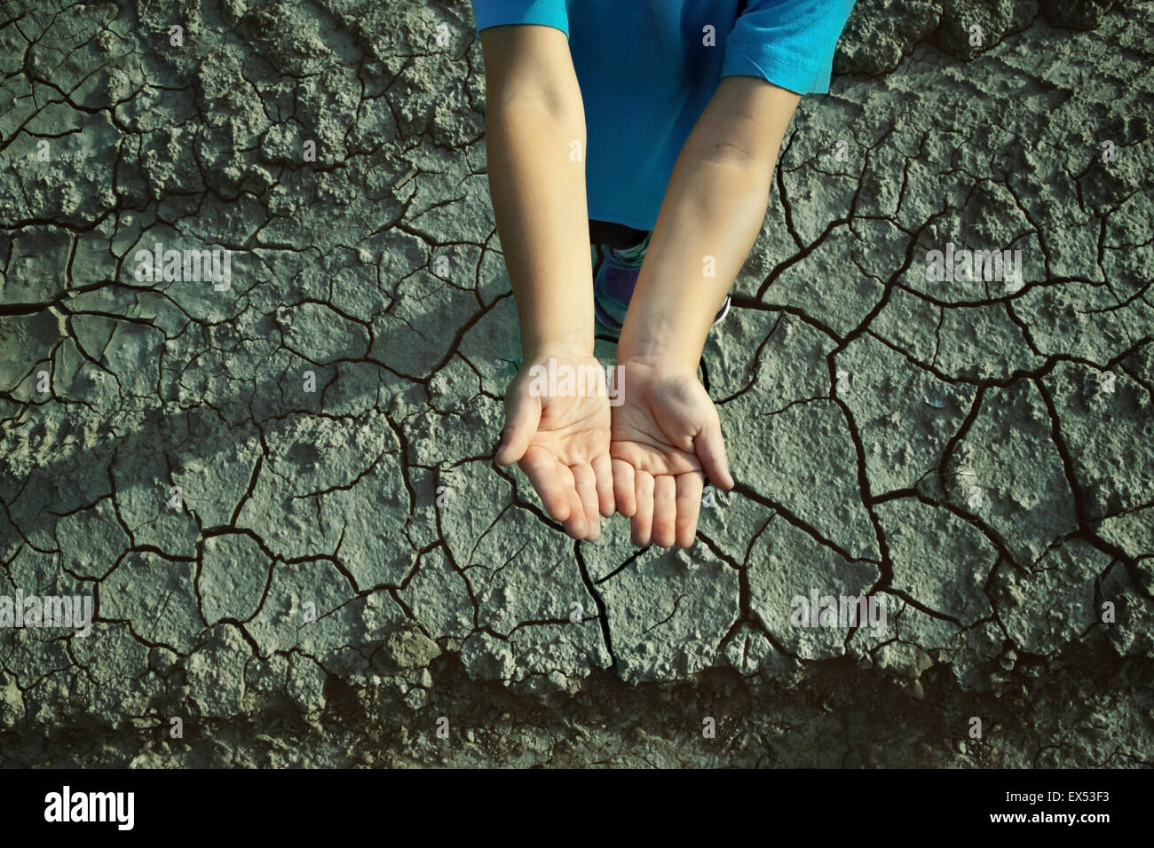 Hands outstretched in a gesture of help Stock Photo - Alamy