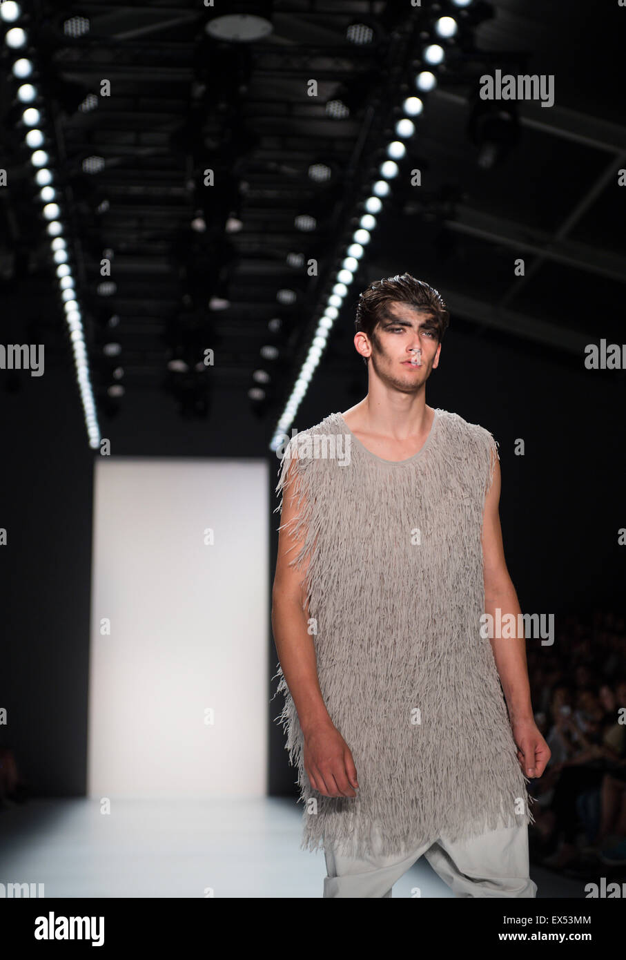 Berlin, Germany. 07th July, 2015. A model presents a creation of German ...