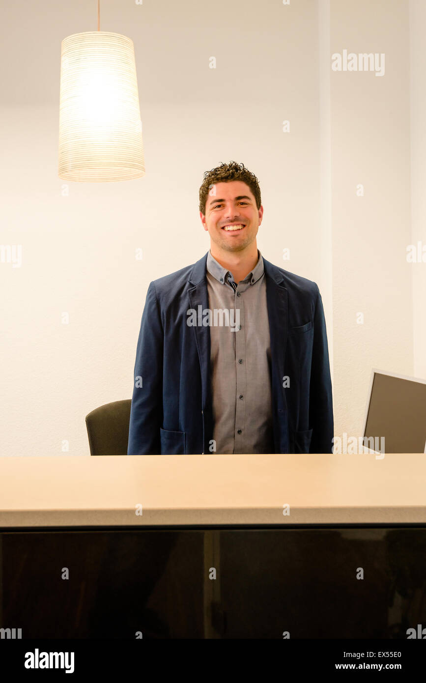 Hotel receptionist male hi-res stock photography and images - Alamy
