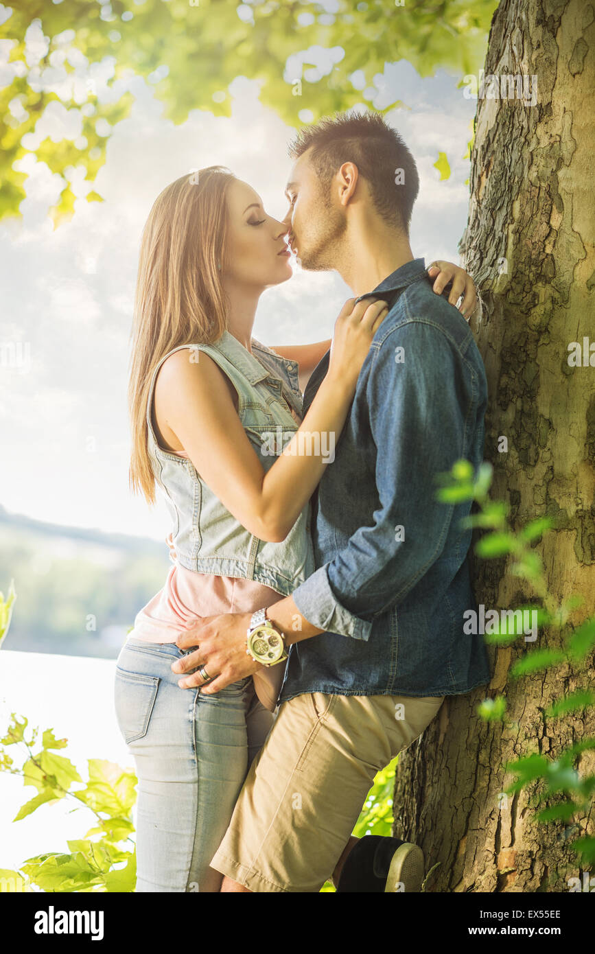 Couple kissing in lake hi-res stock photography and images - Alamy