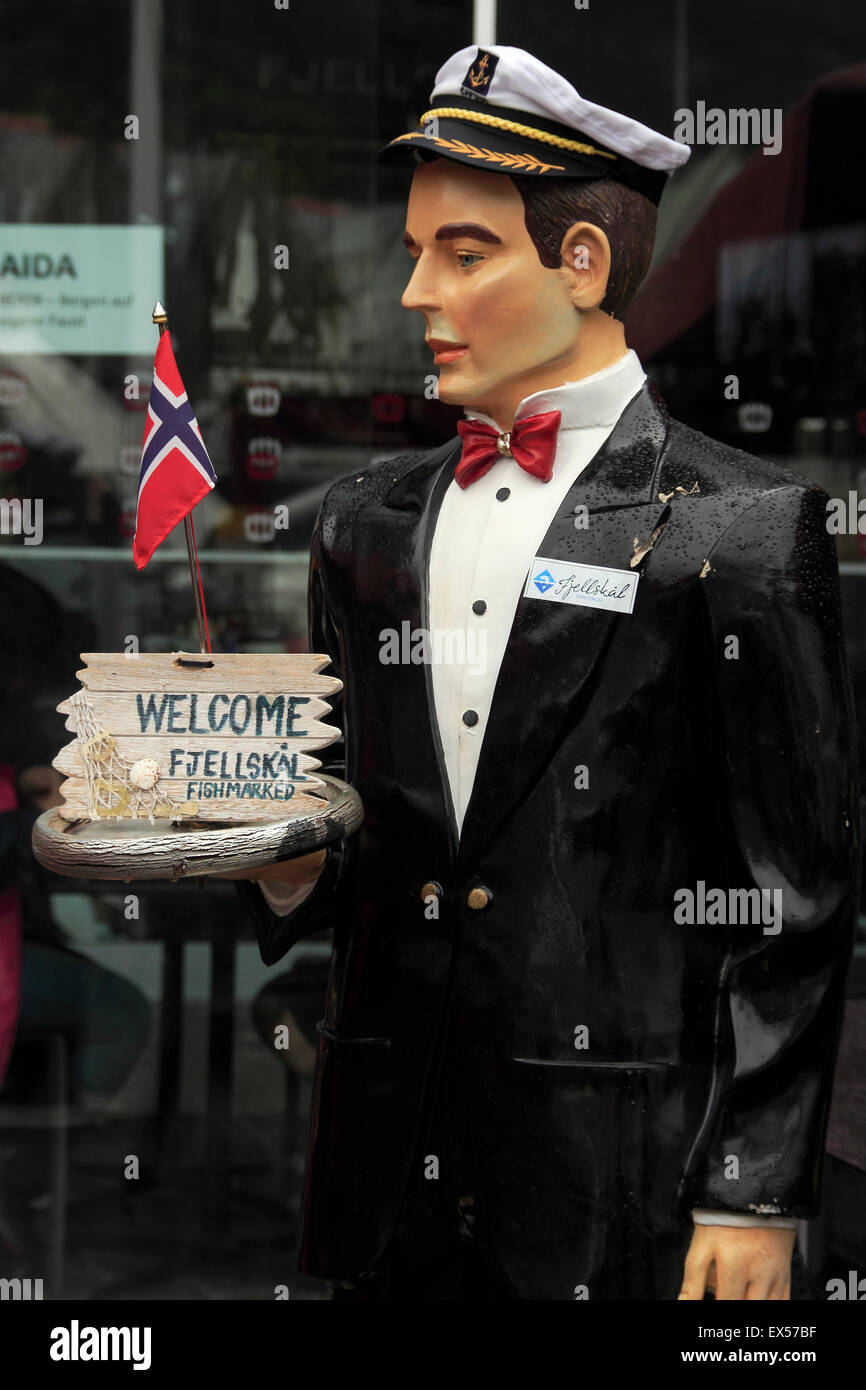 Mannequin holding a welcome sign outside a seafood restaurant, Bergen ...