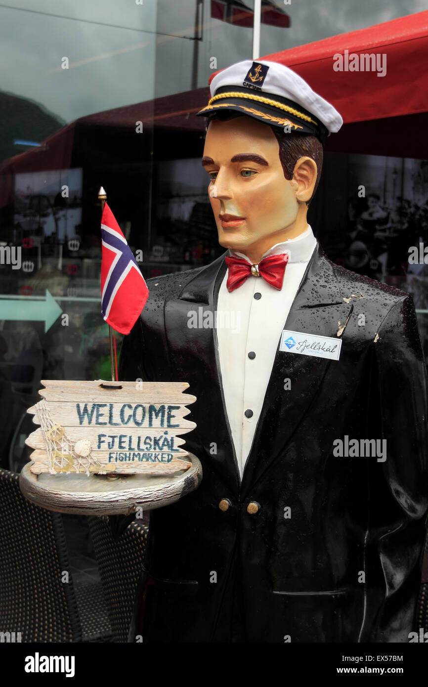 Mannequin holding a welcome sign outside a seafood restaurant, Bergen ...
