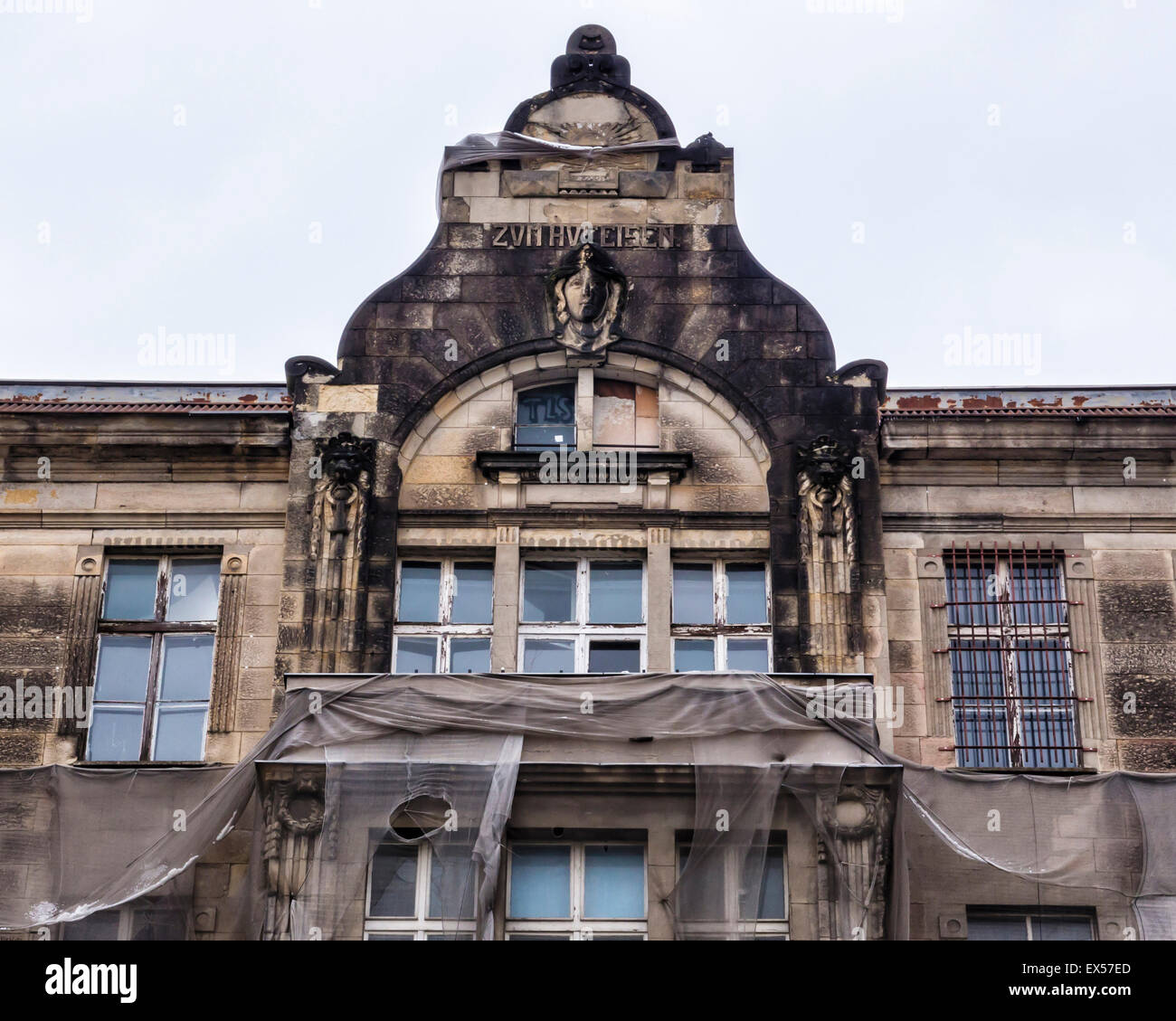 Berlin - old historic building with smoke stained gable, rust, decay ...
