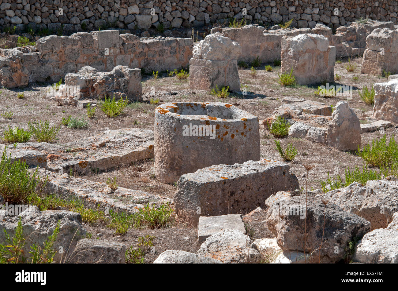 Detail of the stone font and pillars of the Palaeo-Christian basilica ...