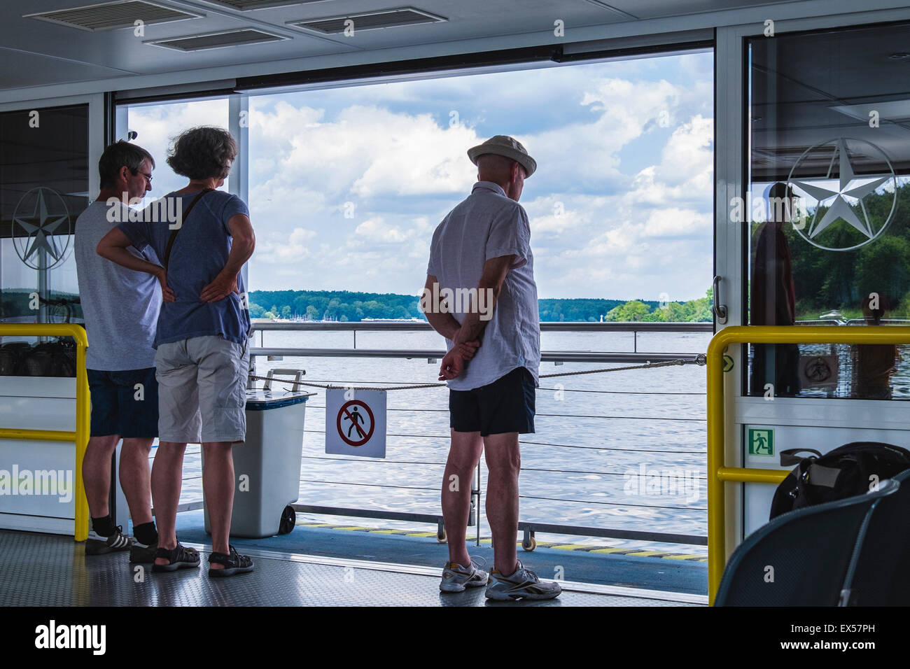 Berlin Wannsee BVG ferry interior & commuters. Ferries cross the Havel ...
