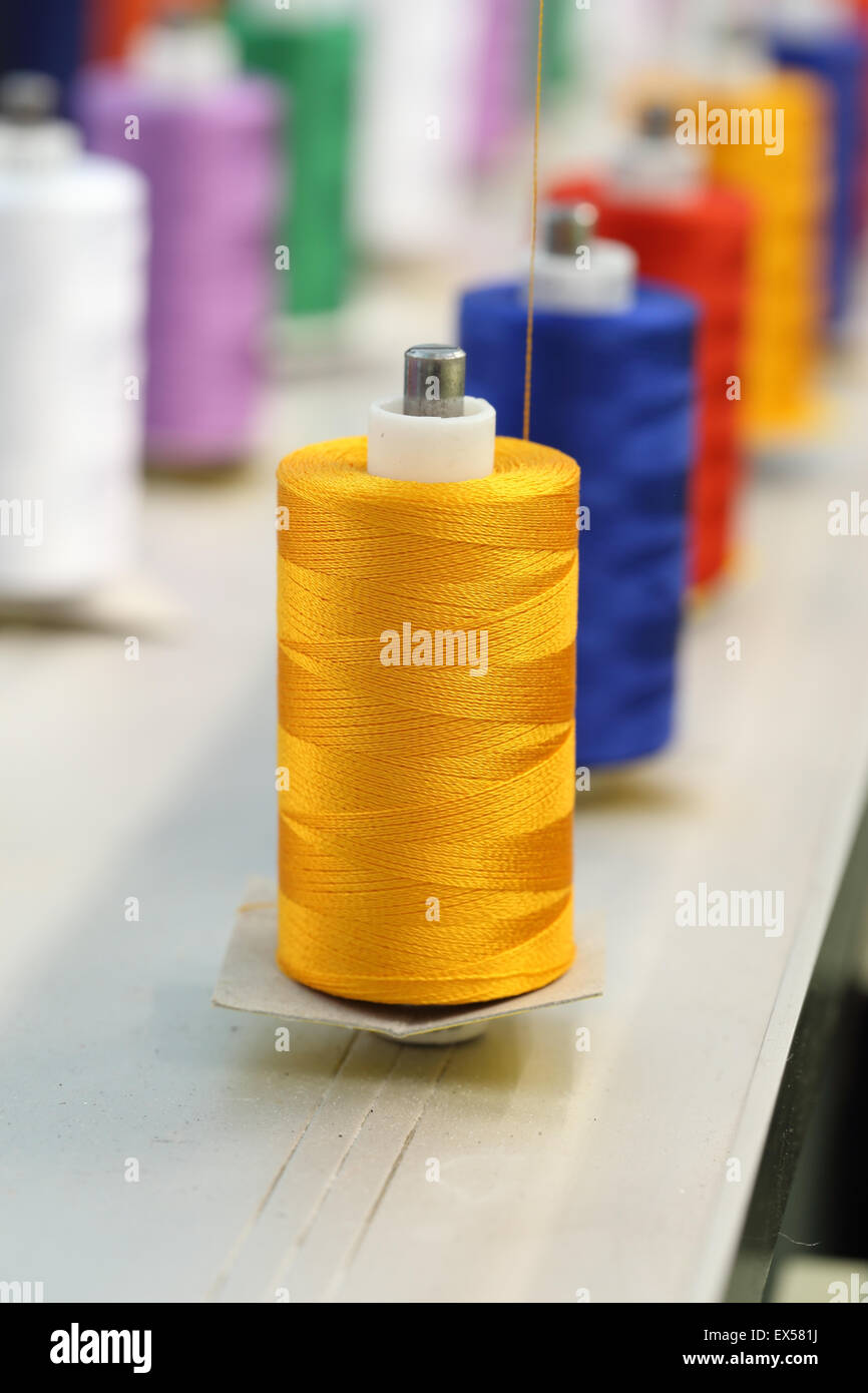 reels of thread on Machine embroider Stock Photo - Alamy