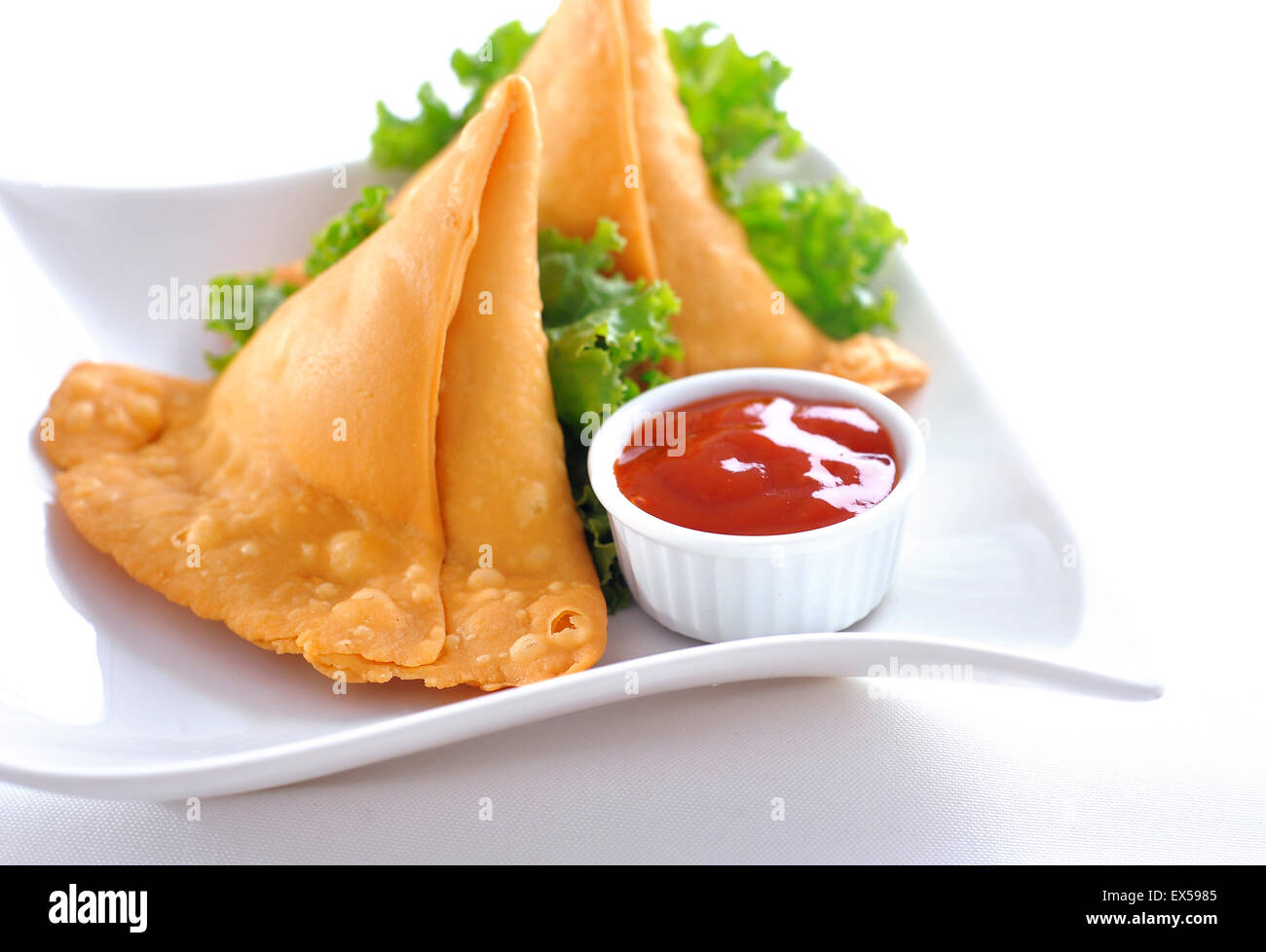 Potato Samosa in White Dish with Ketchup Stock Photo - Alamy