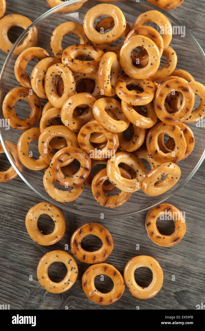 Dried biscuits on timber table, close up Stock Photo - Alamy