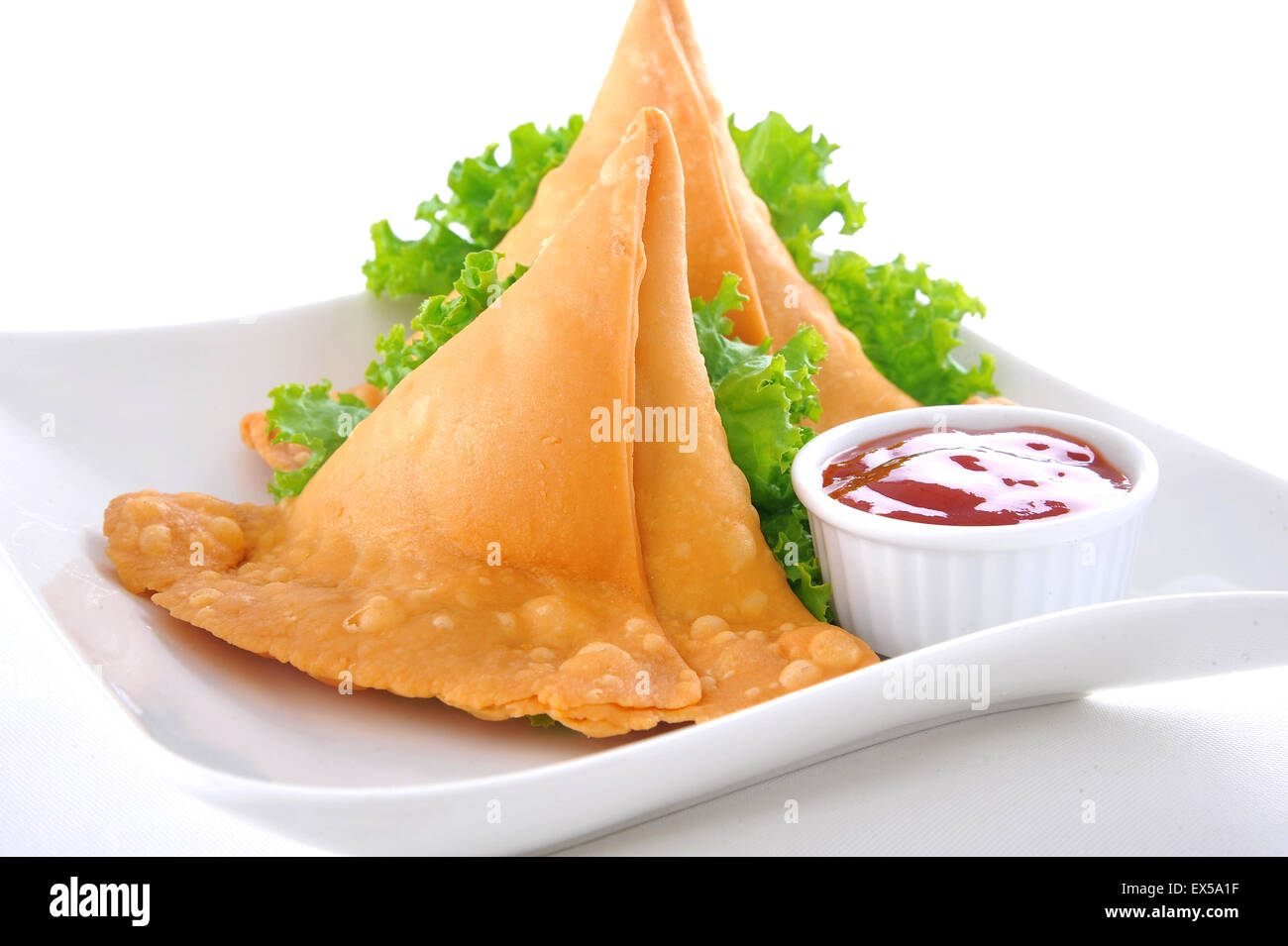 Potato Samosa in White Dish Stock Photo - Alamy