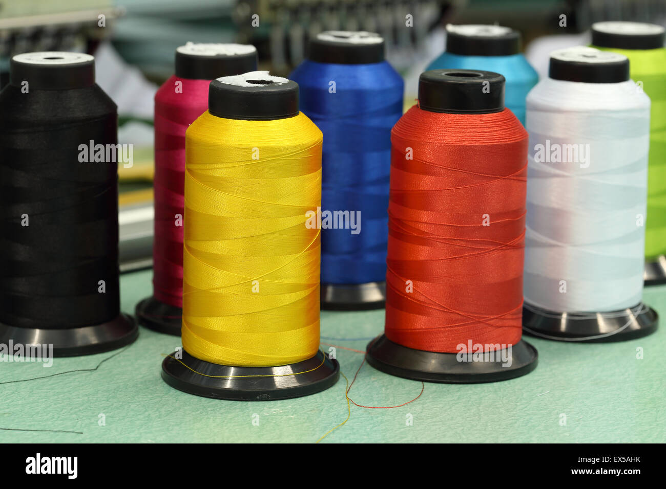 Sewing machine colorful threads hi-res stock photography and images - Alamy