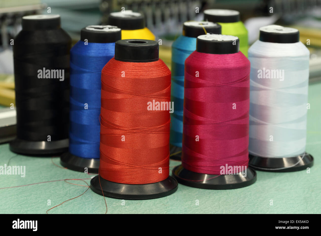 reels of thread of Machine embroider Stock Photo - Alamy