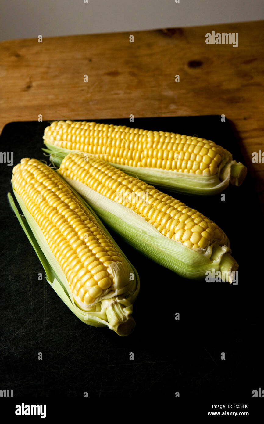 Three fresh corn on the cob Stock Photo - Alamy