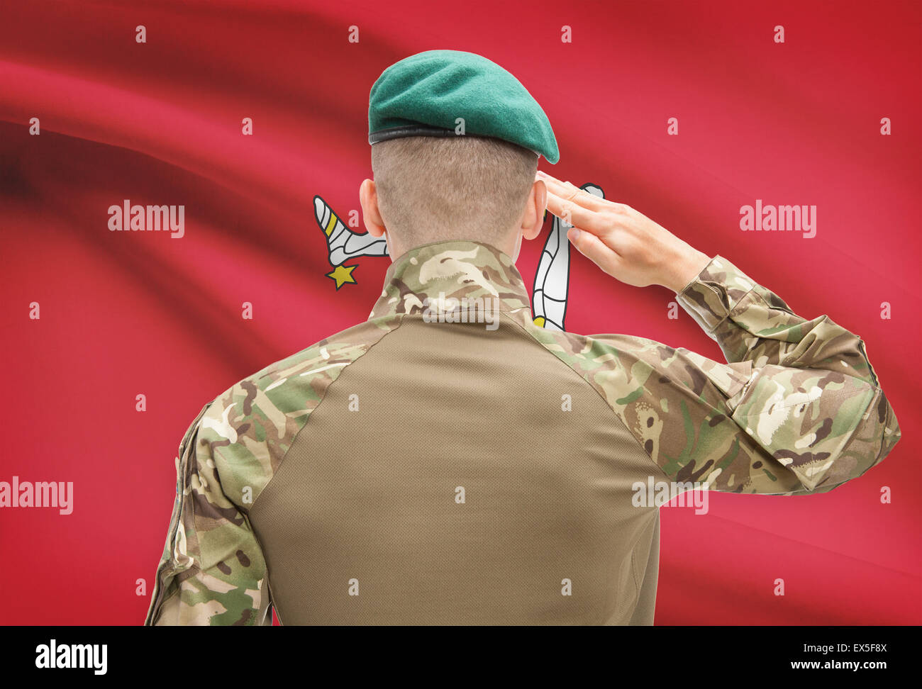 Soldier in hat facing national flag series - Isle of Man Stock Photo ...