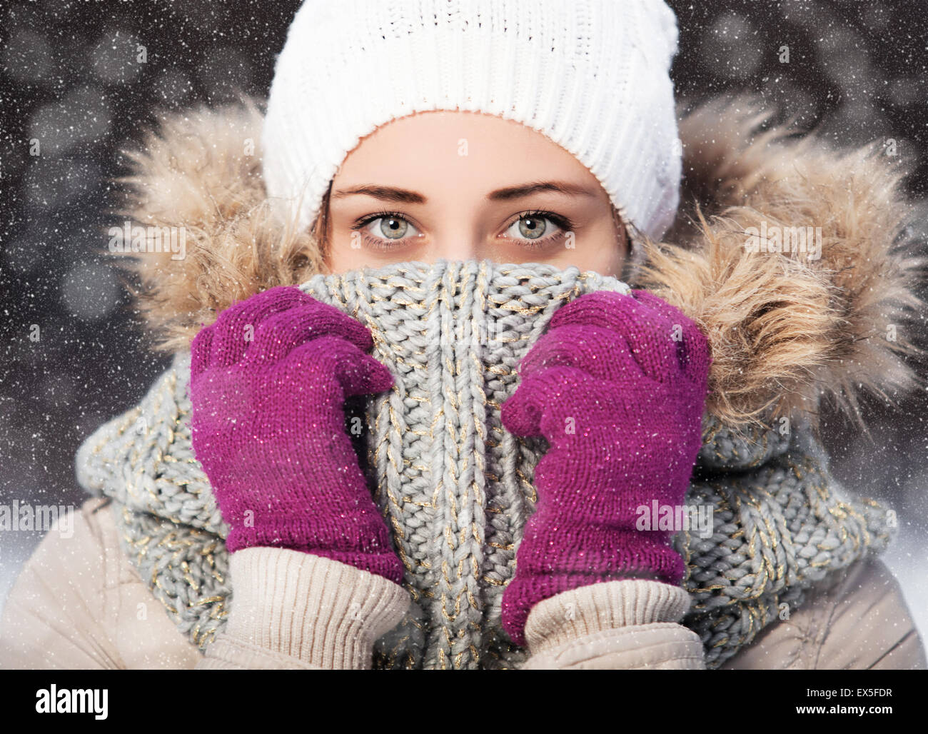 Portrait of a beautiful girl in scarf and gloves. flying snow Stock ...