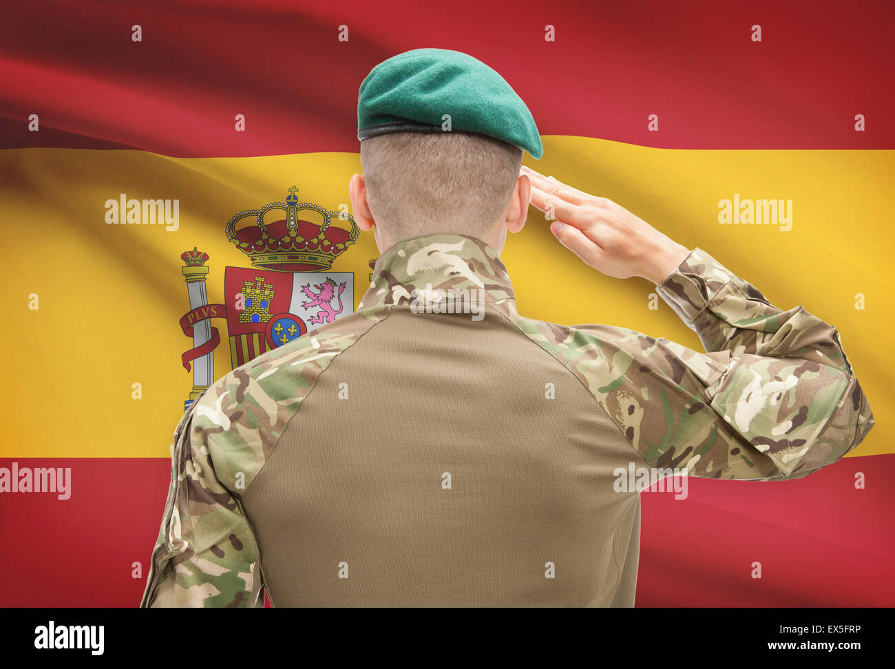 Soldier in hat facing national flag series - Spain Stock Photo - Alamy