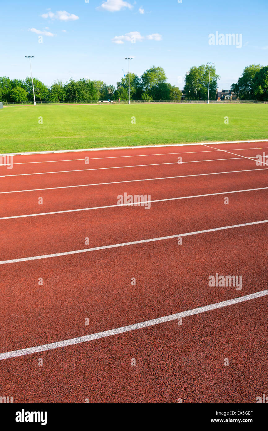 Athletic running track in modern red rubber close-up abstract ...