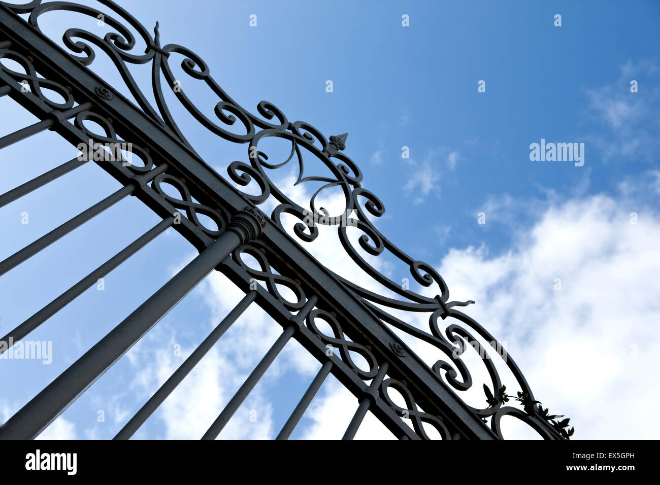 Stylish wrought iron gate in a park Stock Photo - Alamy