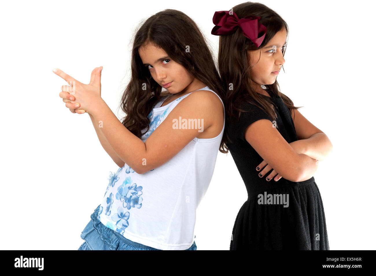 Cute young girls without speaking Stock Photo - Alamy