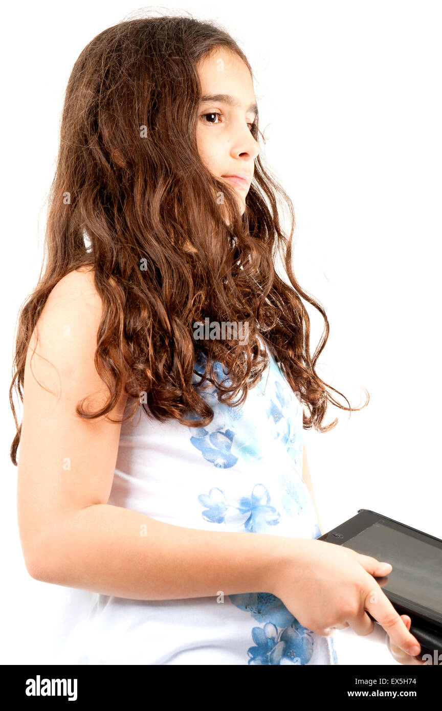 Cute child holding a tablet Stock Photo - Alamy