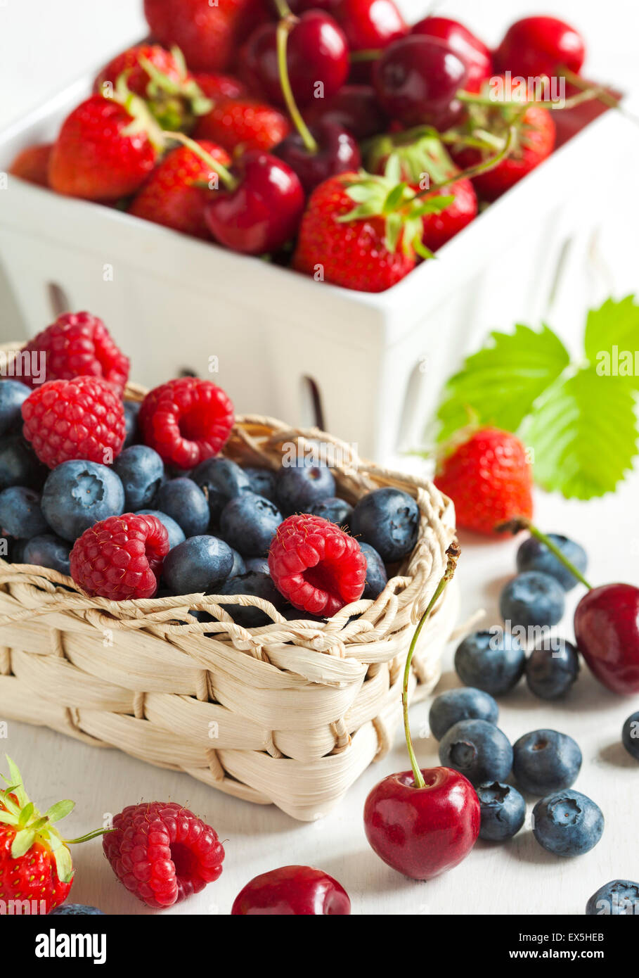 Summer berries in basket Stock Photo - Alamy