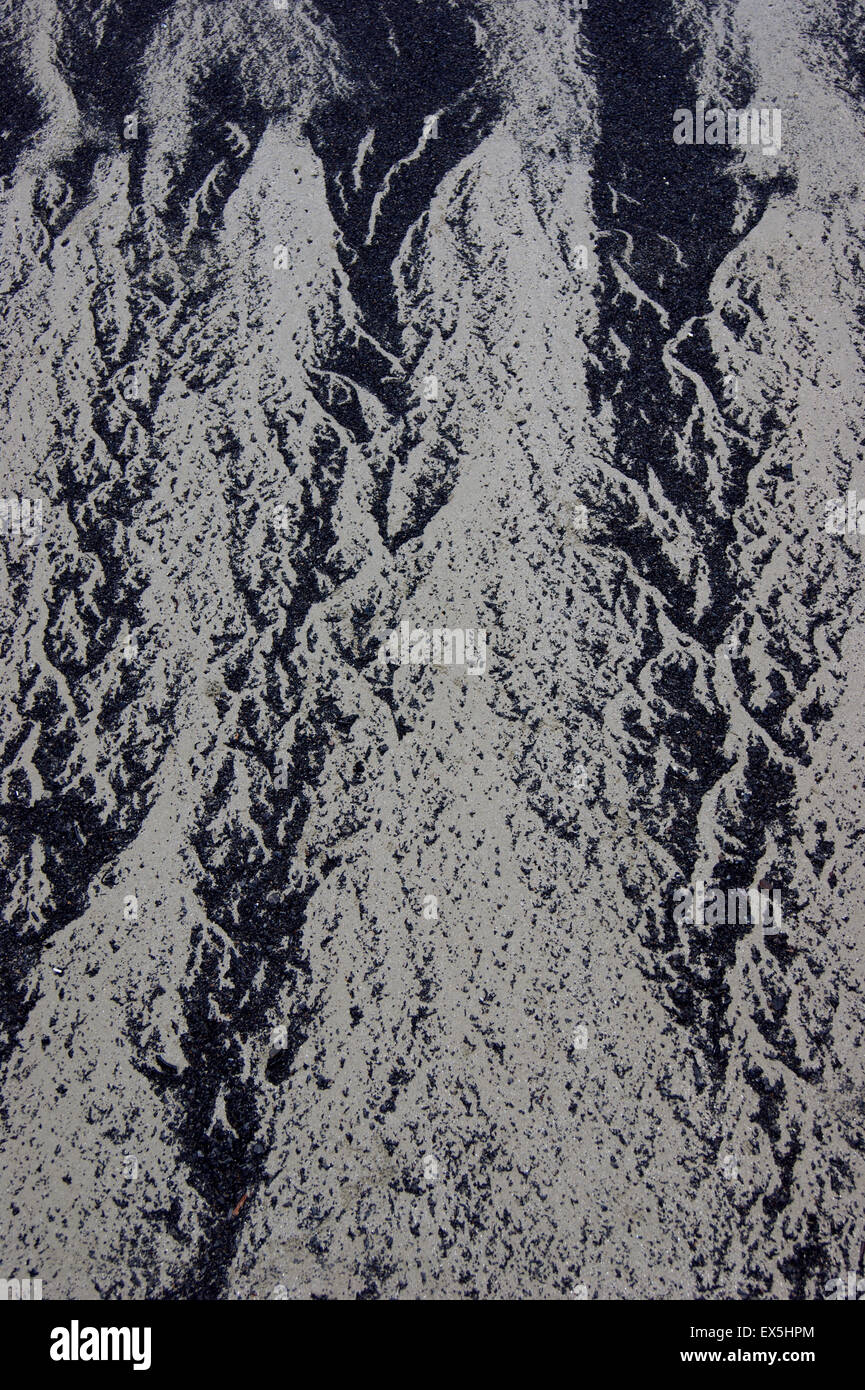 black and white sand. abstract theme designed directly by the nature ...