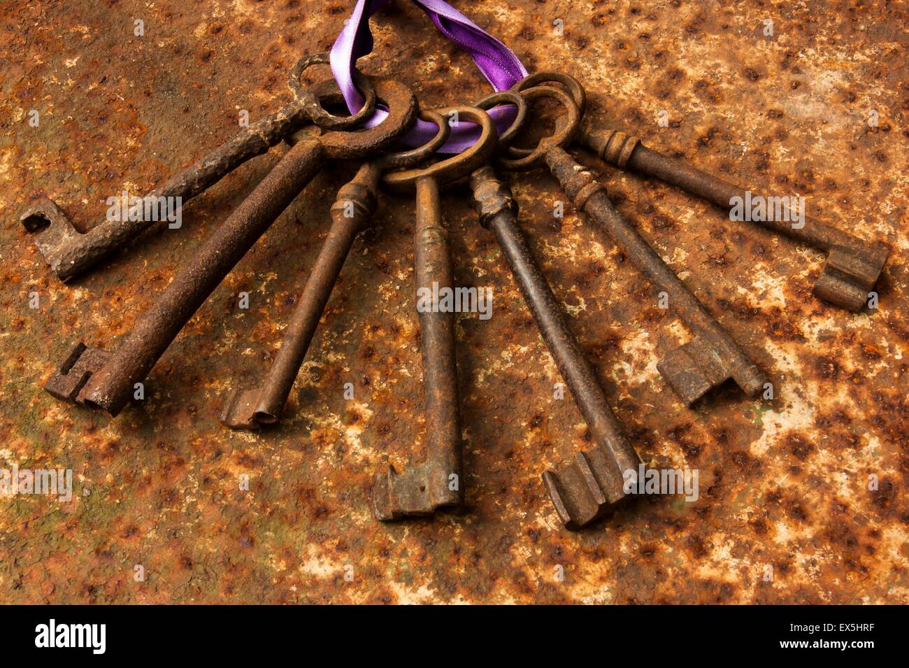 Old keys on a rusty surface Stock Photo - Alamy