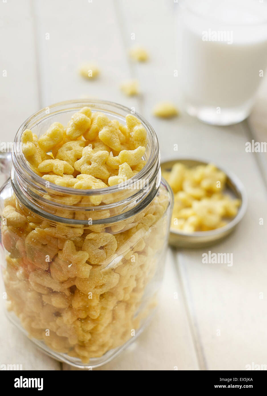 sugar-coated corn flakes with milk background Stock Photo - Alamy